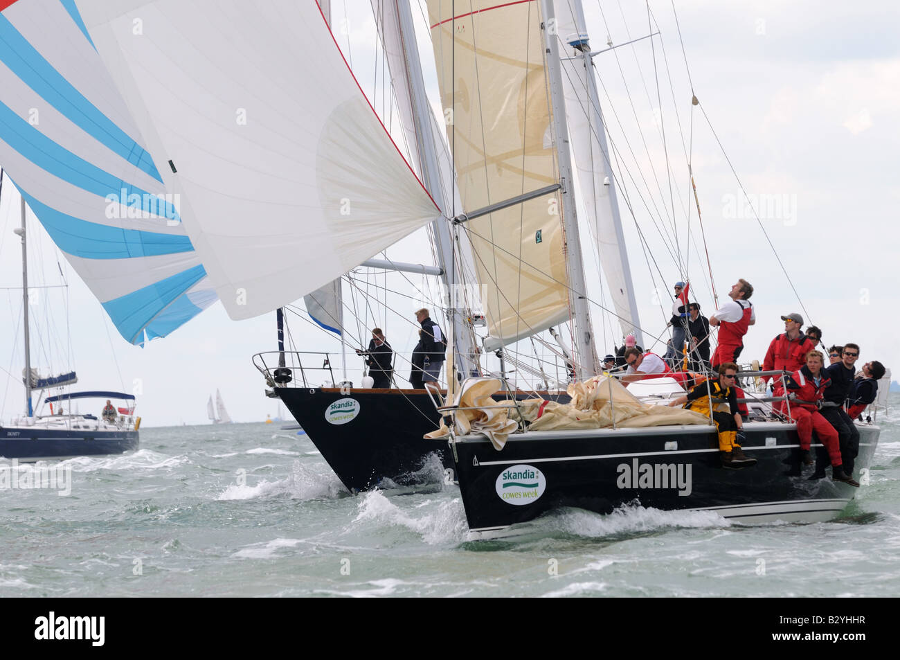 racing yachts crossing the finish line sailing Cowes Week Isle of Wight ...