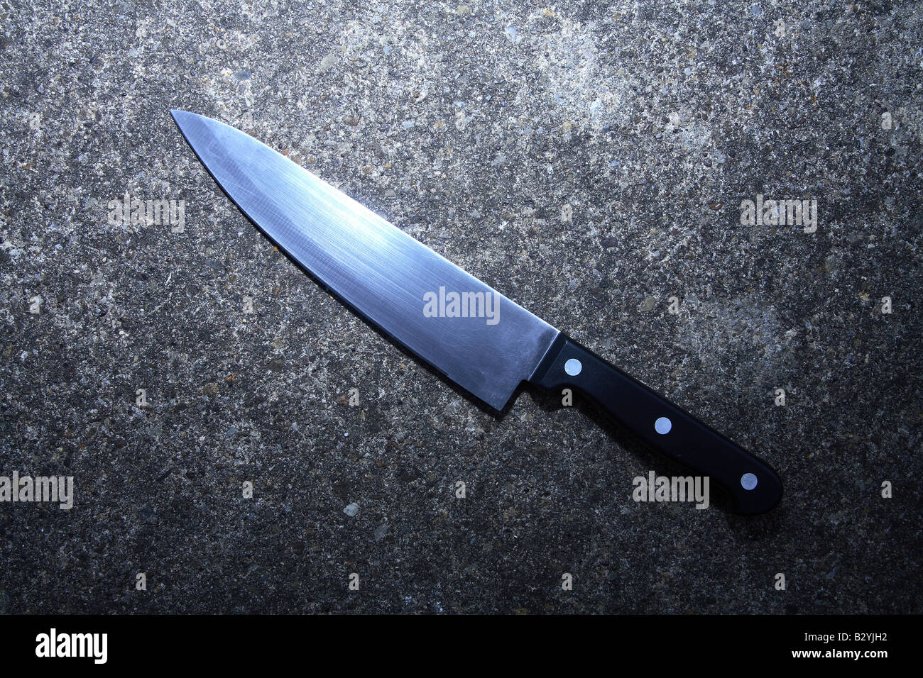 Knife on the ground Stock Photo - Alamy