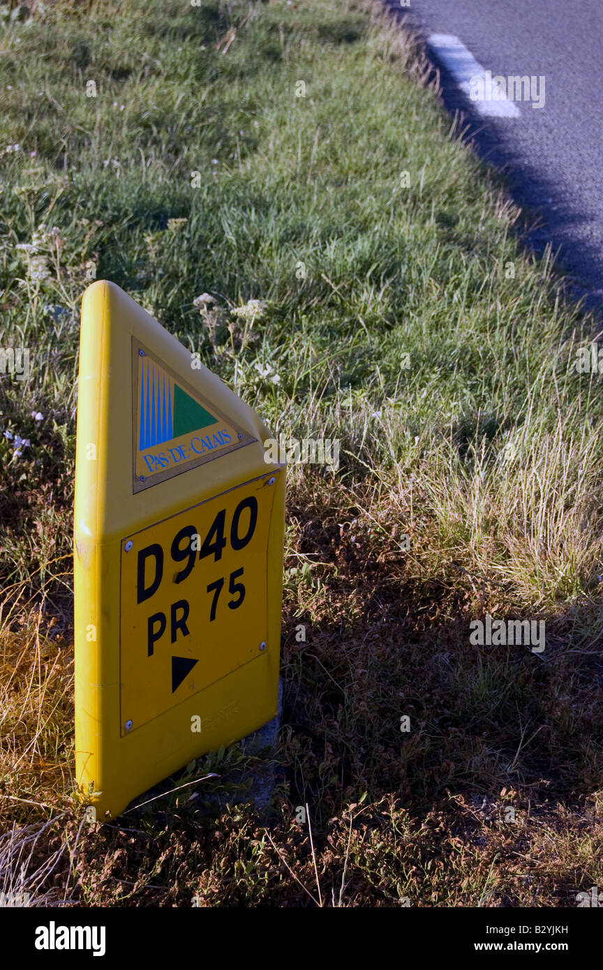 Yellow road marker Stock Photo - Alamy