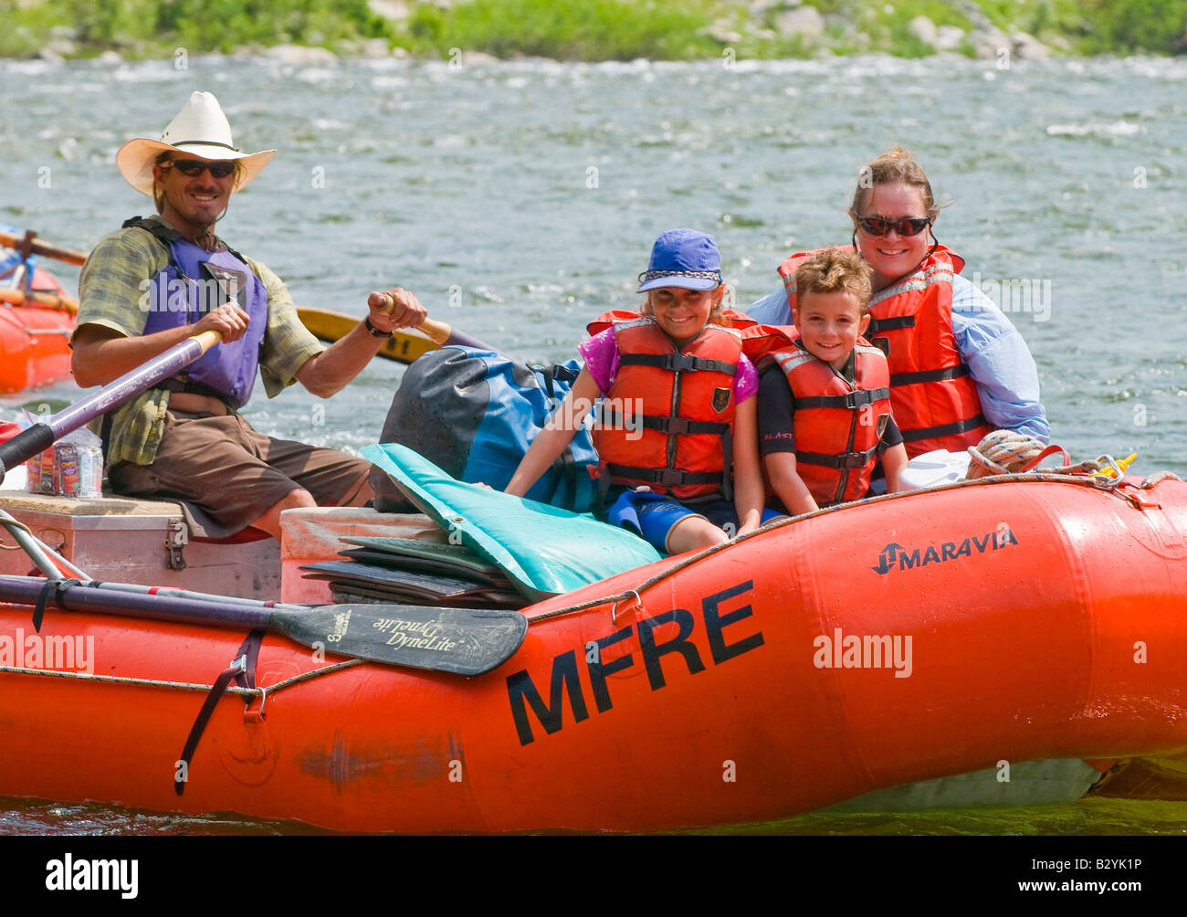 Idaho, Middle Fork of the Salmon River. Happy rafters and guide raft ...