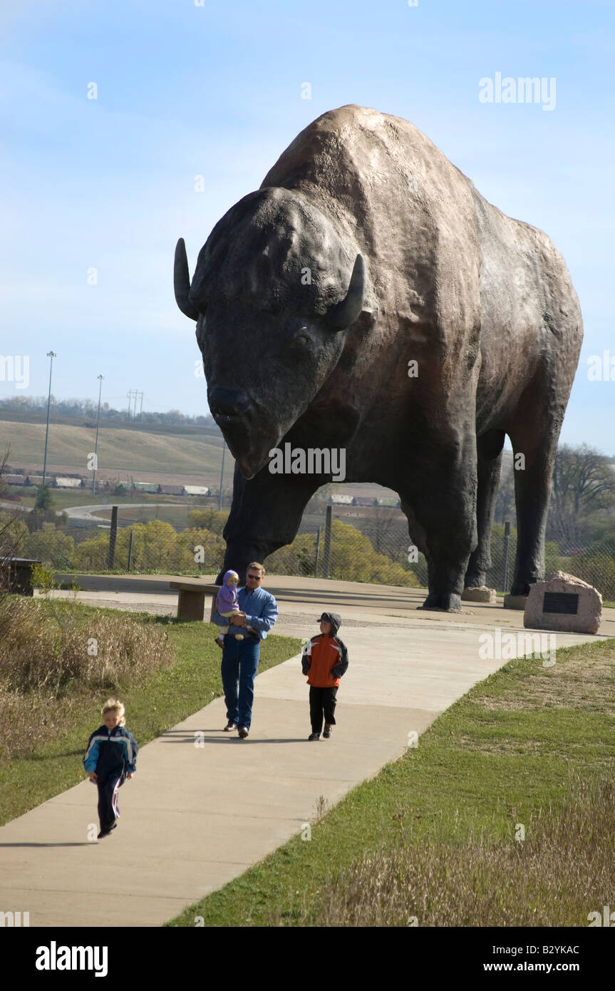 Family at the World's Largest Buffalo Monument at the Frontier Village ...