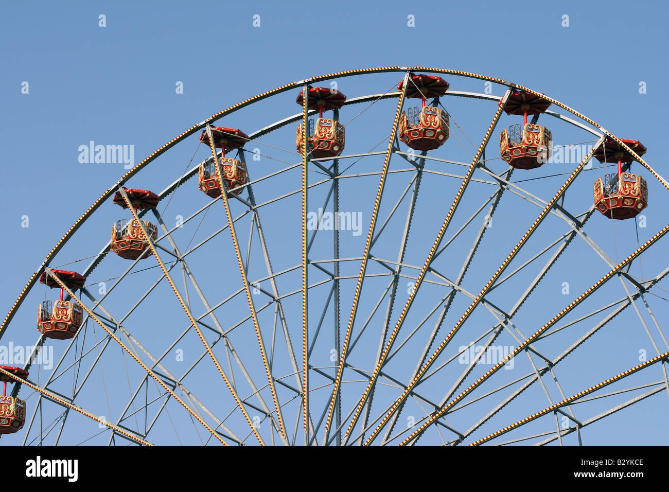 big ferris wheel at amusement park and blue sky Stock Photo - Alamy