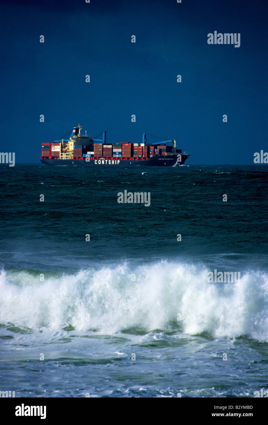Container Ship traveling through heavy seas Stock Photo - Alamy