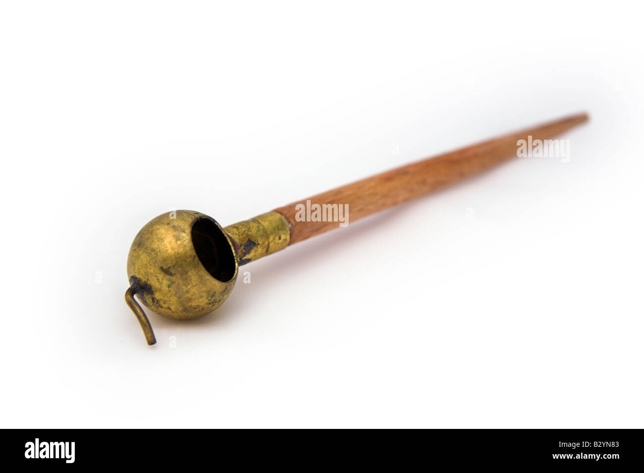 Batik tool for wax, white background Stock Photo - Alamy