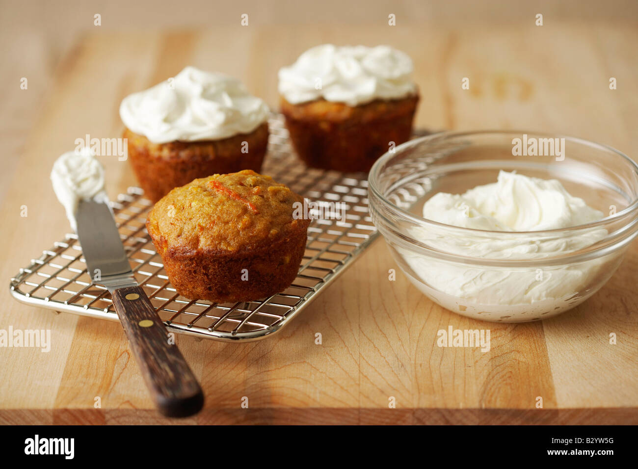 Muffins with Cream Cheese Icing Stock Photo - Alamy