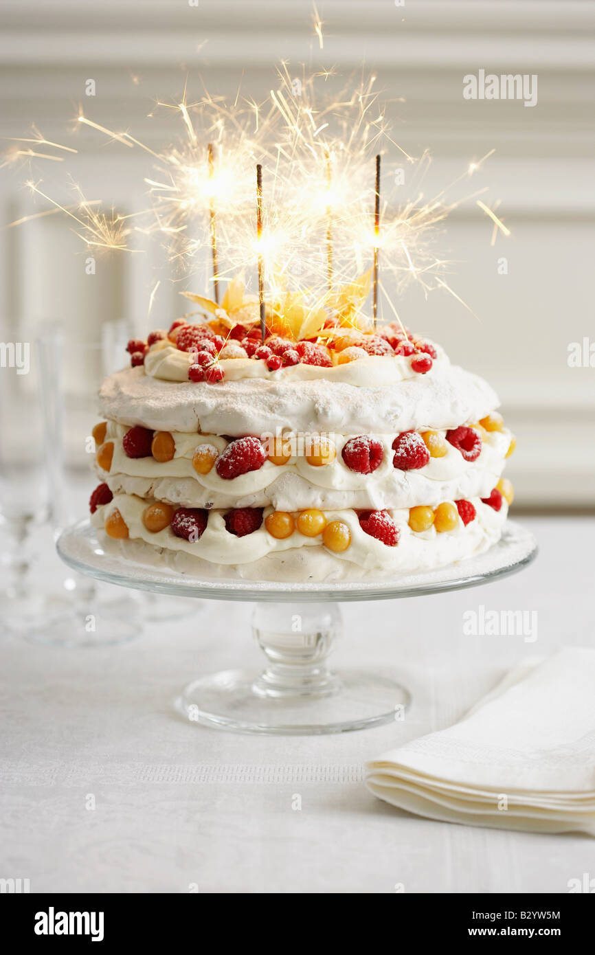 Meringue with Fruit and Sparklers Stock Photo - Alamy