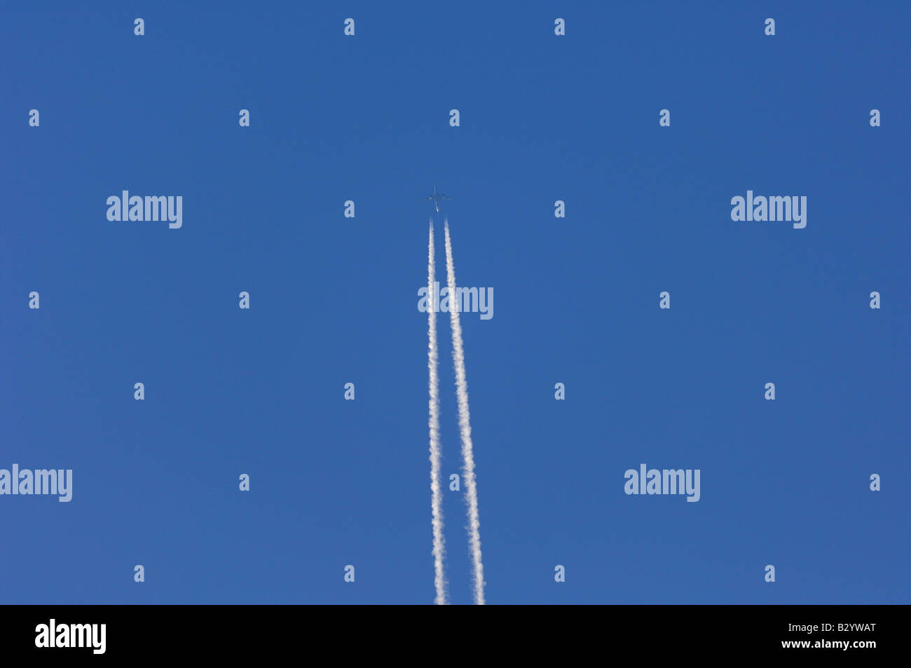 Jet Contrail in Blue Sky Stock Photo - Alamy