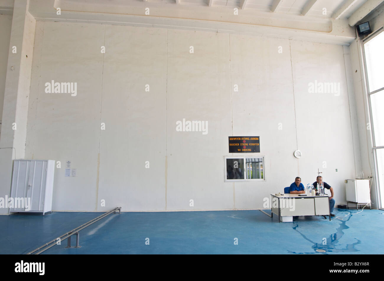Two men guarding the distillation room. Tsantali Vineyards & Winery ...
