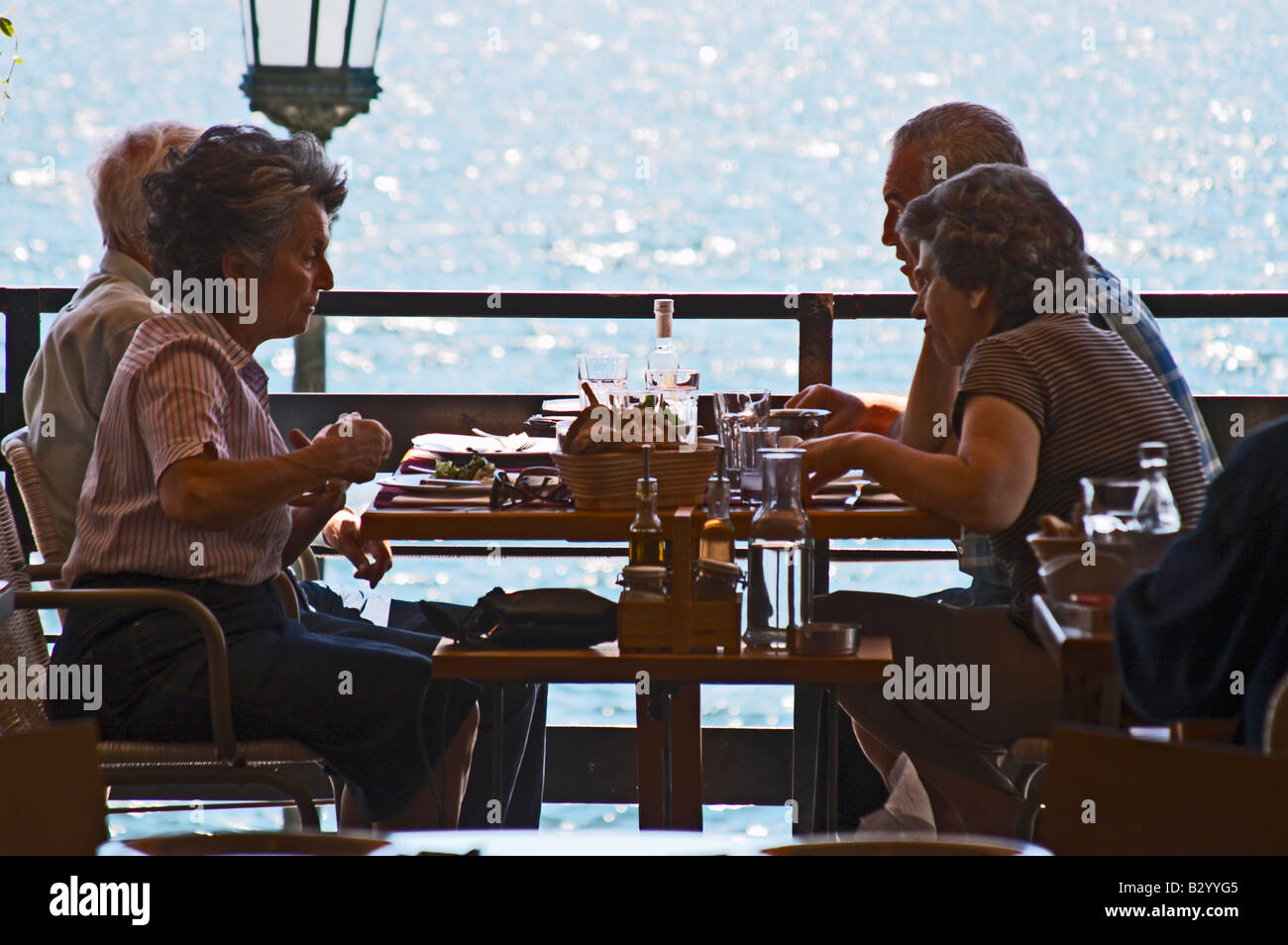 Two senior citizens couples lunching. YaMas restaurant on the ...