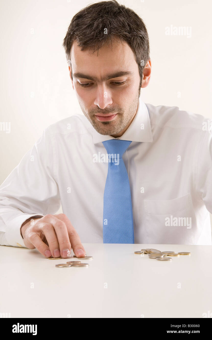 Man Counting Coins Stock Photo - Alamy