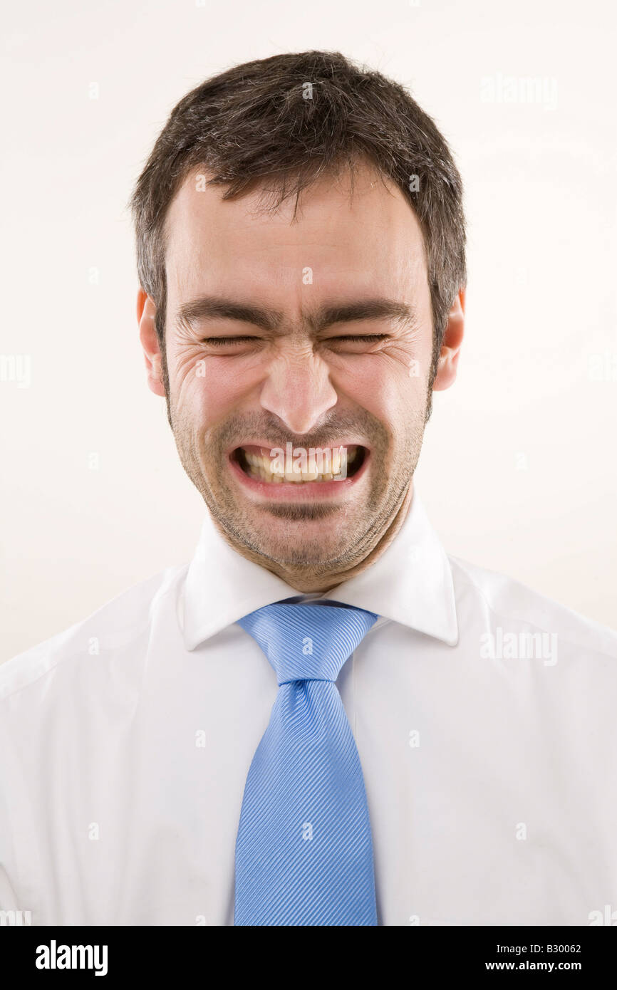 Man Clenching Teeth Stock Photo - Alamy