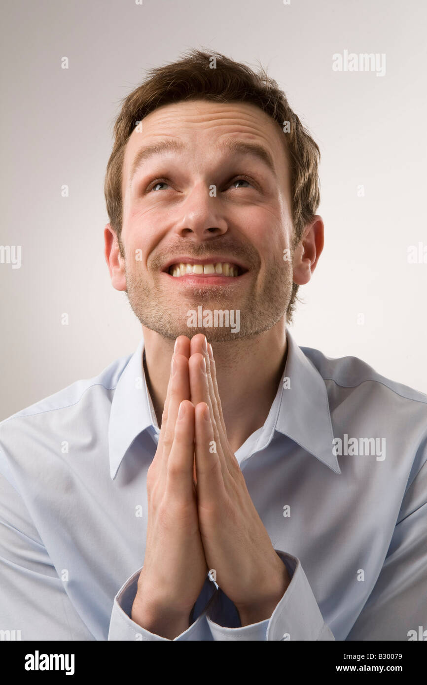 Portrait of Man Praying Stock Photo - Alamy