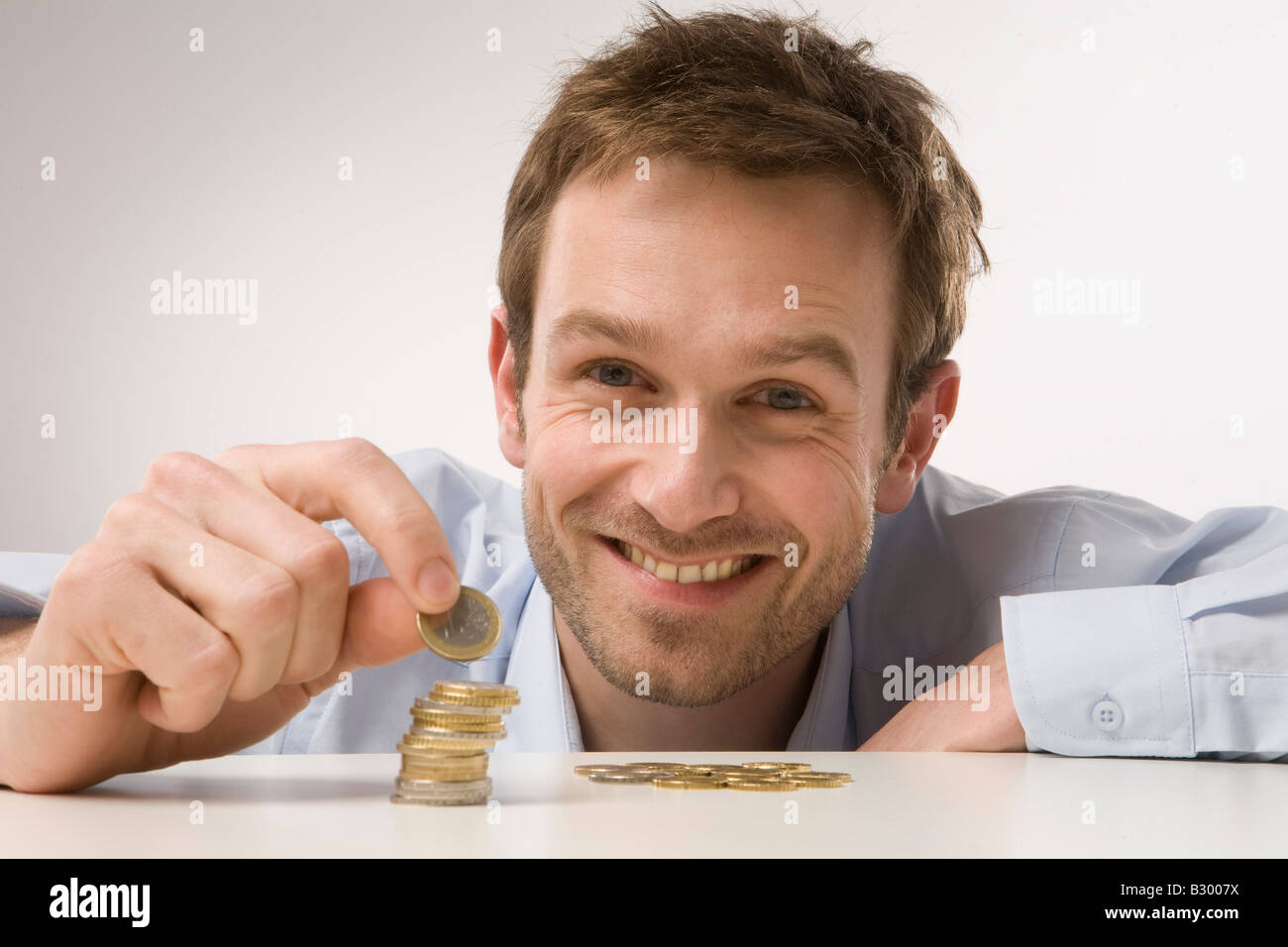 Man Counting Coins Stock Photo - Alamy