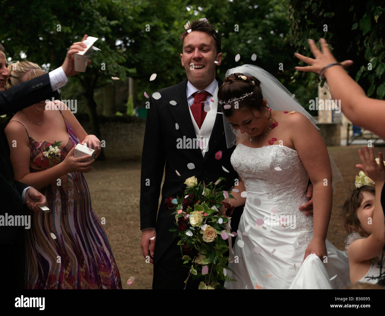 Bride and Groom Showered in Confetti Stock Photo - Alamy