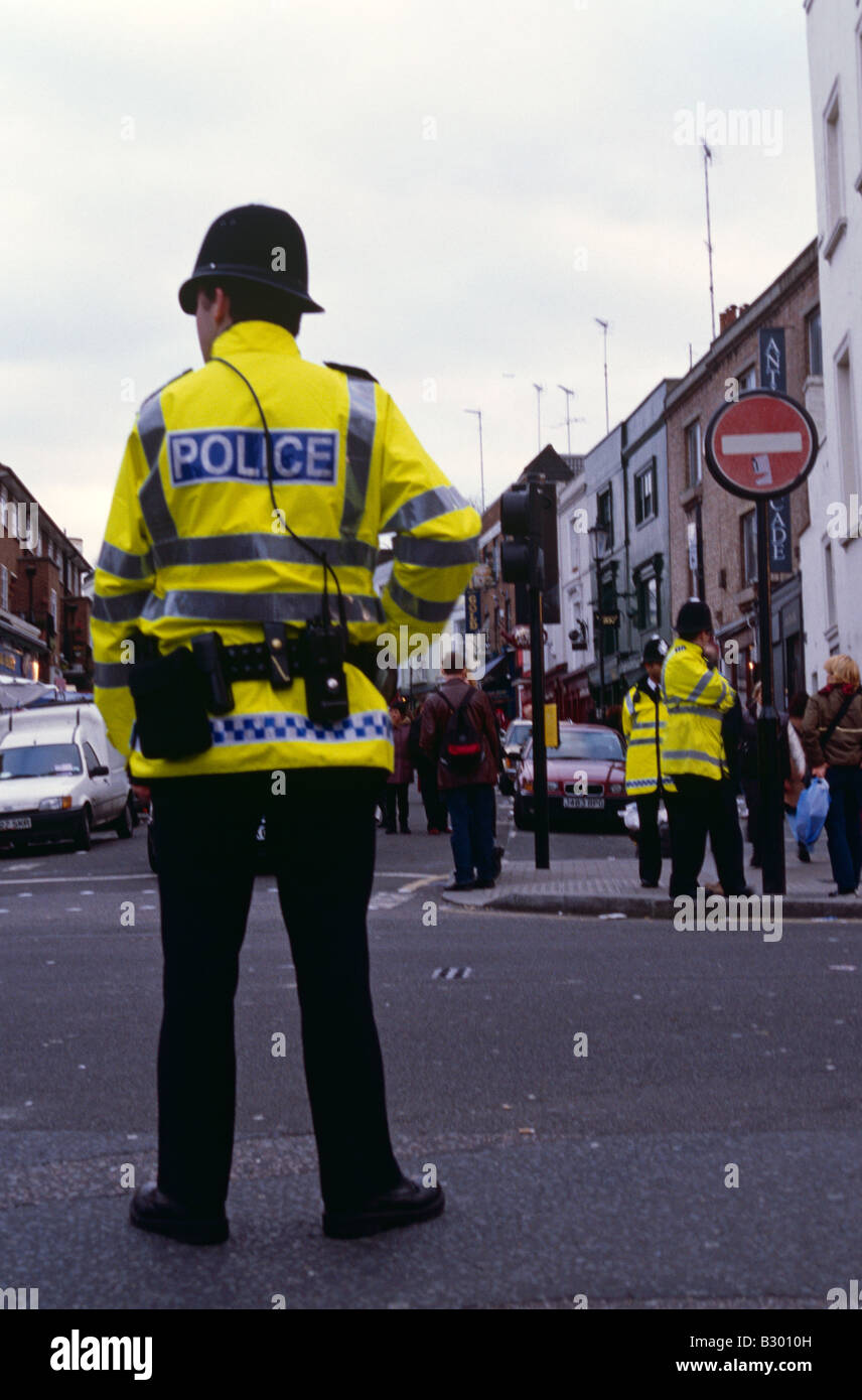 Uk police man rear view hi-res stock photography and images - Alamy
