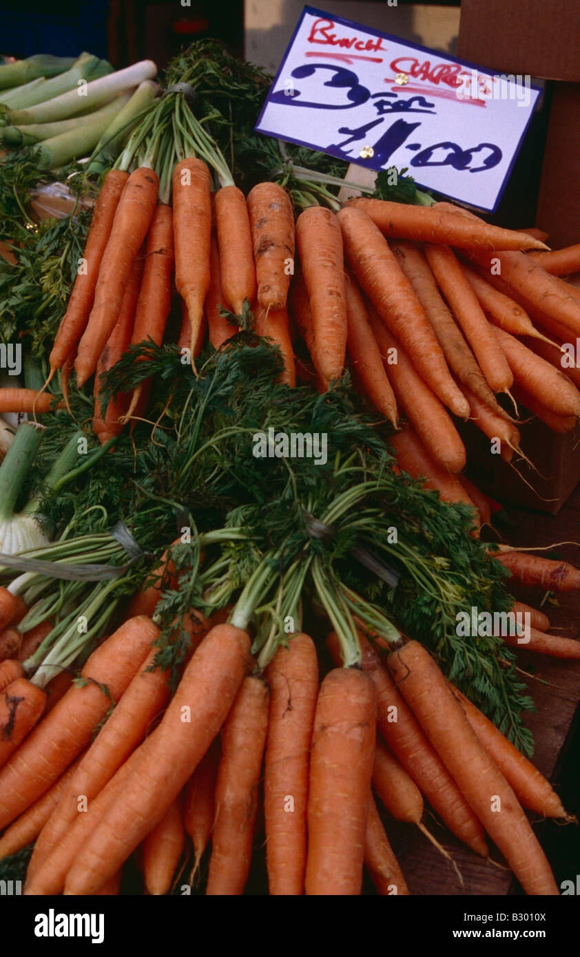 Carrots sold at market stall, London, UK Stock Photo - Alamy