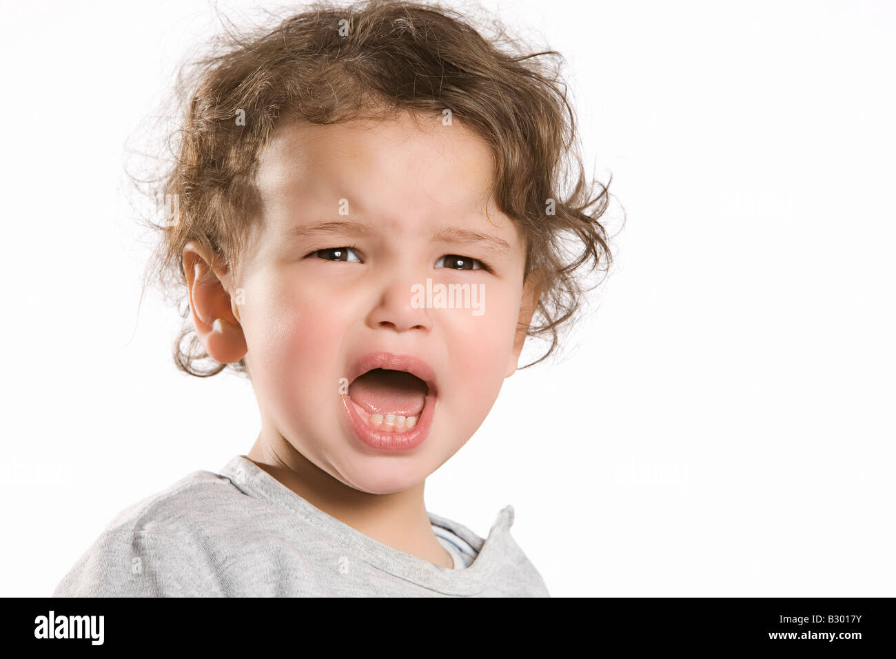 Crying baby girl white background hi-res stock photography and images ...
