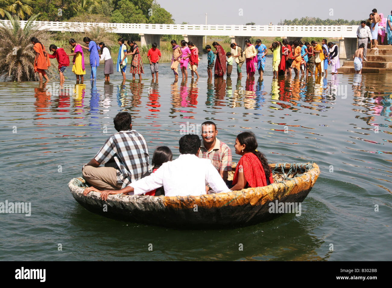 A group enjoys a coracle ride at Balmuri Waterfalls, near Mysore ...