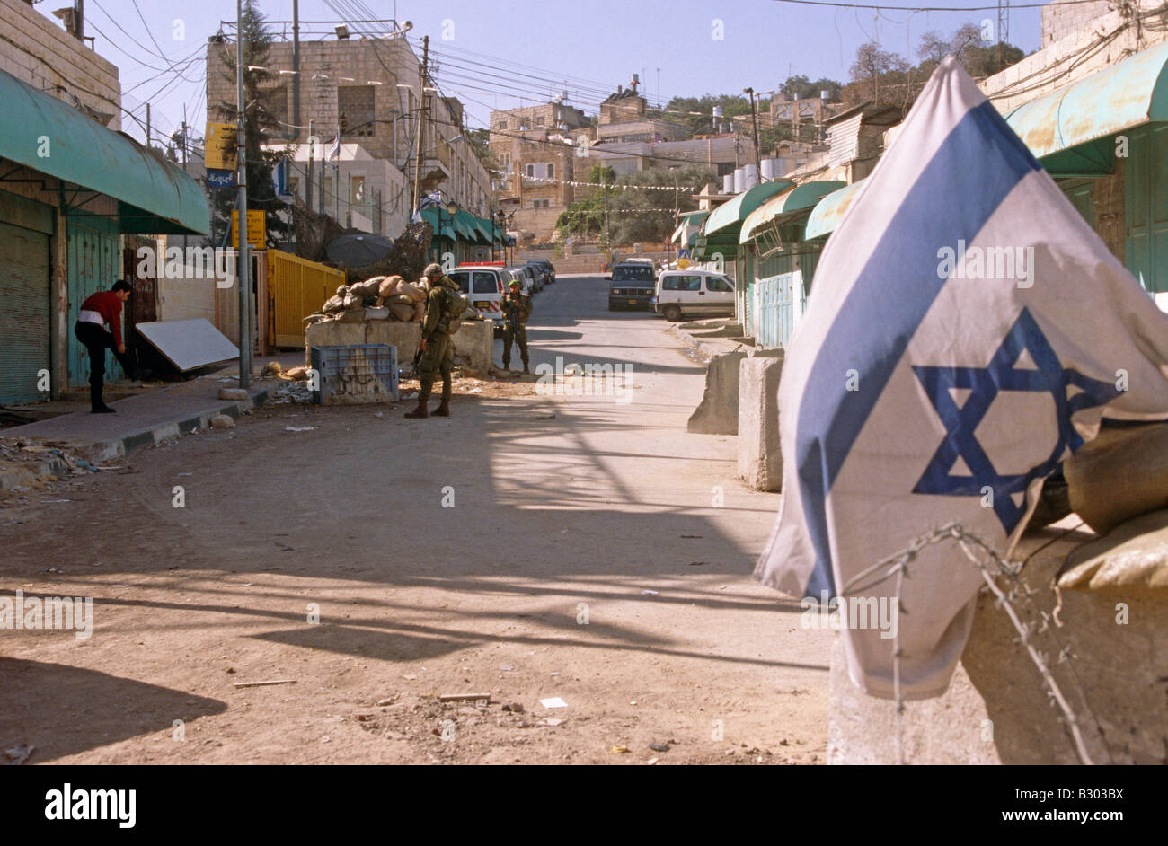 Armed guards at a Jewish settlement in Hebron, Palestine Stock Photo ...