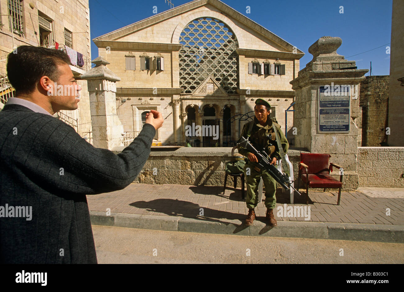 Armed guard at a Jewish settlement in Hebron, Palestine Stock Photo - Alamy