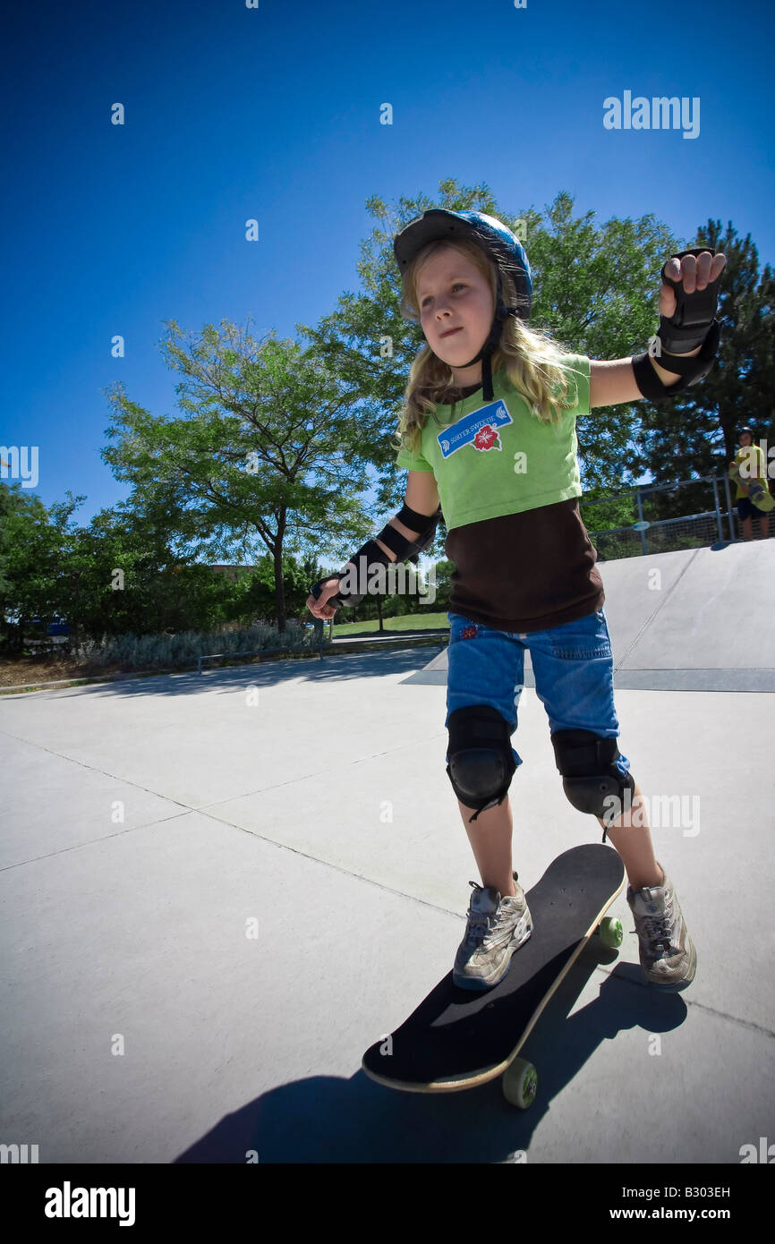 Girl with Skateboard in Skate Park Stock Photo - Alamy