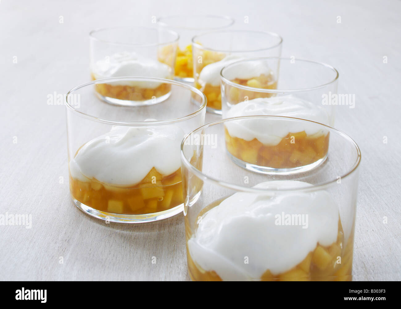 Mango and Whipped Cream Dessert Stock Photo - Alamy