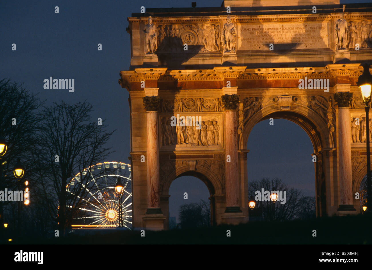 Arc de Triomphe du Carrousel and Roue de Paris. Paris, France Stock ...