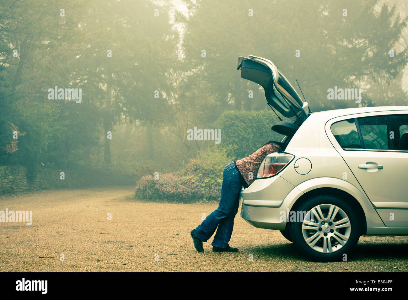 Old woman bent over hi-res stock photography and images - Alamy