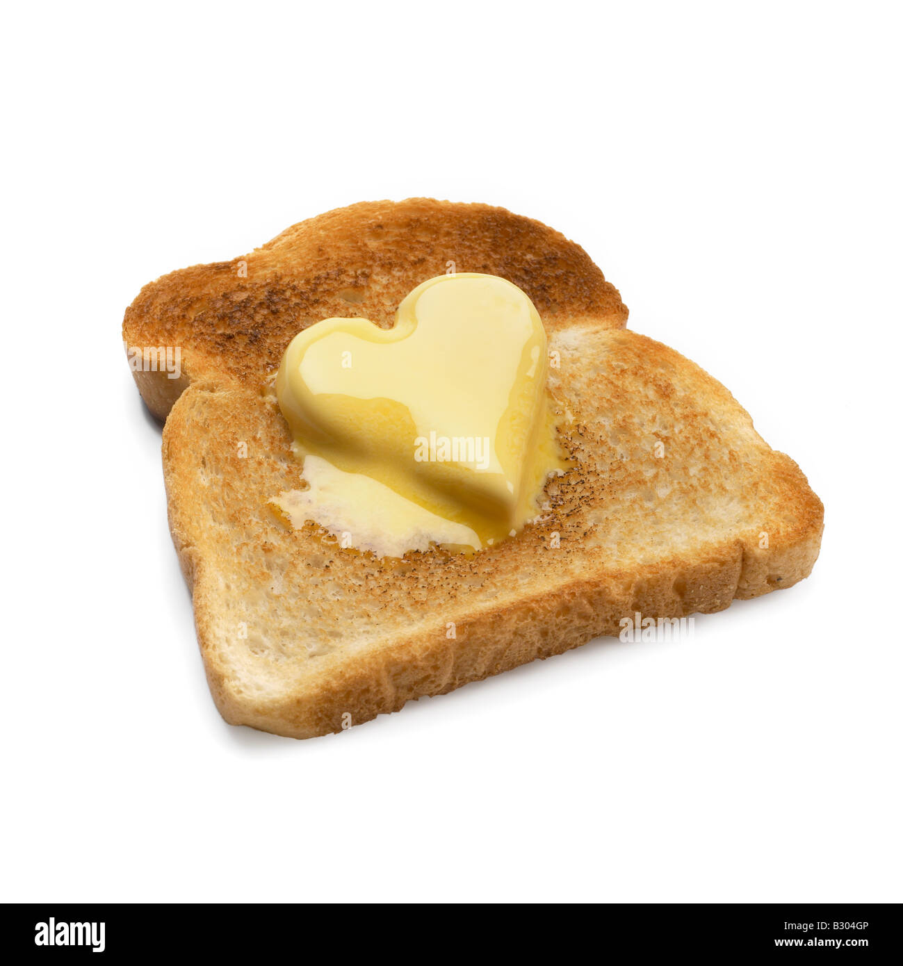 Slice of toast with heart shaped pat of butter Stock Photo - Alamy