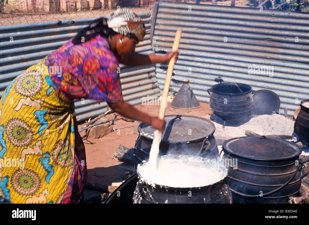 Woman cooking with cauldron for wedding feast. South Africa Stock Photo ...