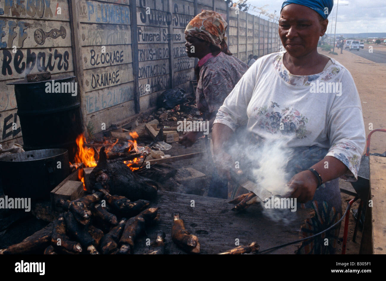 Women cooking at roadside food stall, South Africa, Africa Stock Photo ...