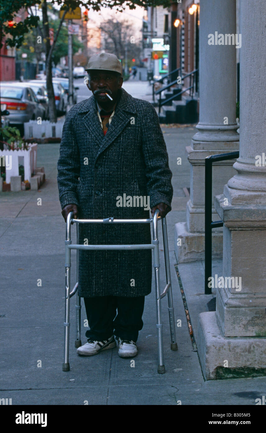 Old man with walker hi-res stock photography and images - Alamy