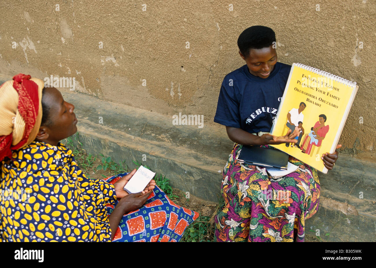 Volunteer of the Community Reproductive Health Workers (CRHW) educating ...