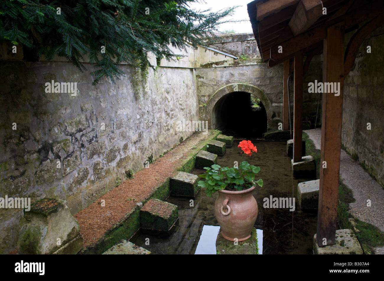 Fontdouce Abbey well and covered washing area in Charente Maritime ...