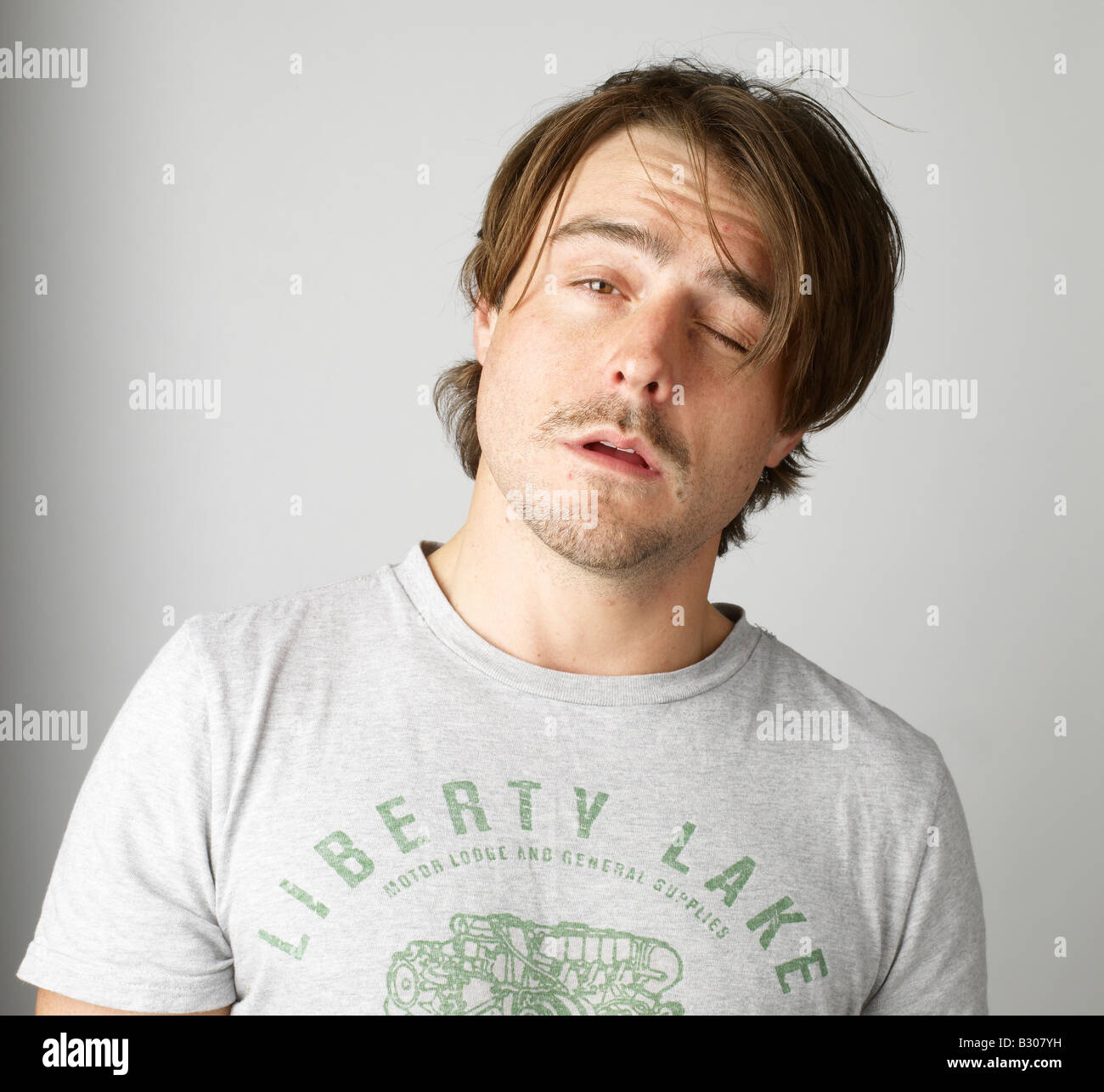 Tired man Stock Photo - Alamy