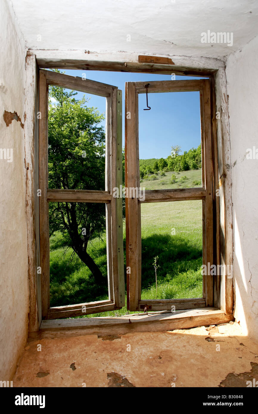 landscape view through an old window Stock Photo - Alamy