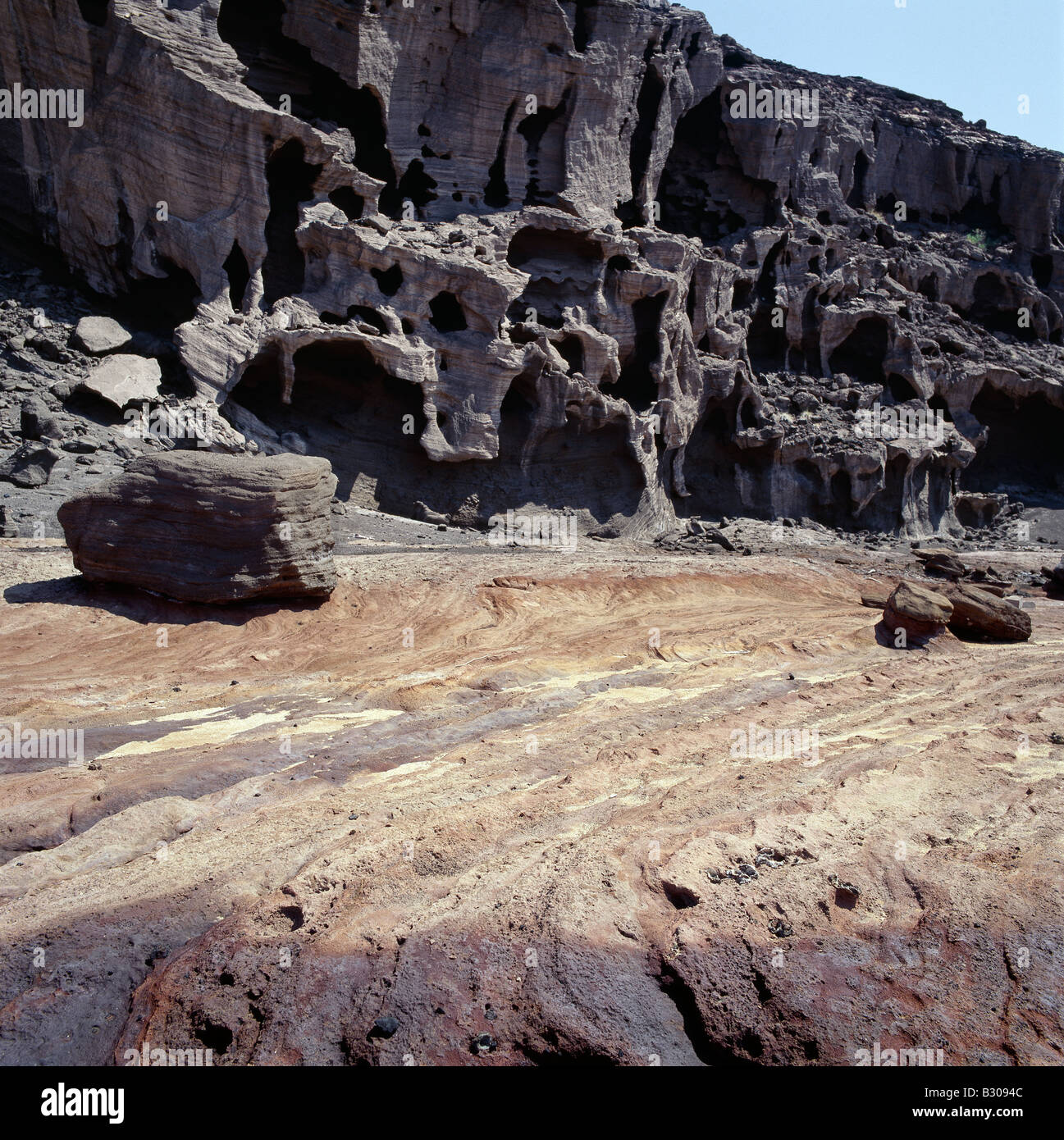 Djibouti, Ghoubbet el Kharab. Sculptured volcanic cliffs on the ...