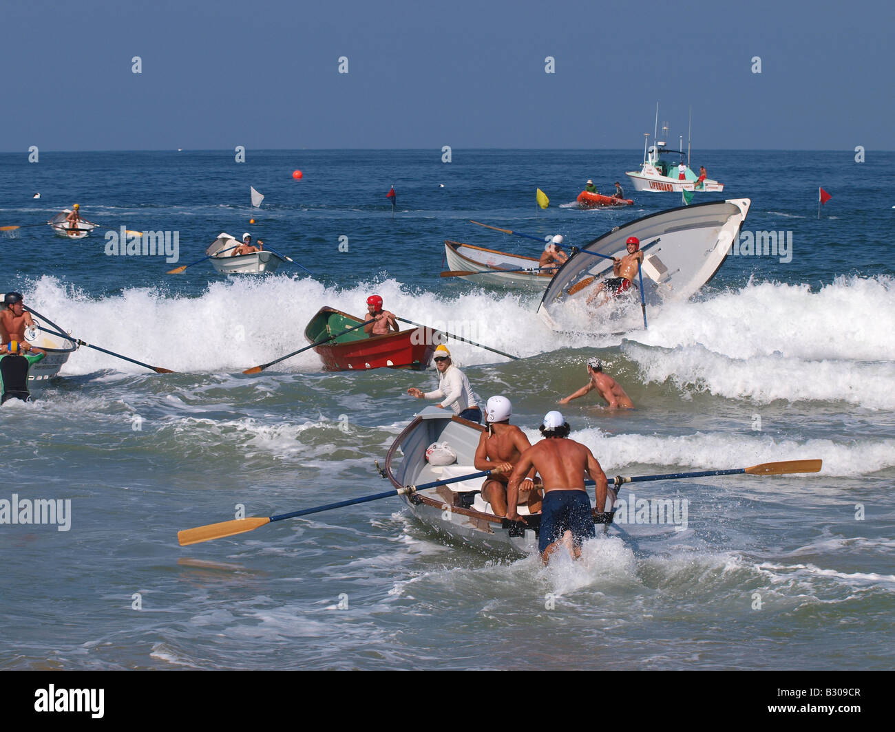 Surf boats breach waves lifeguard hi-res stock photography and images ...
