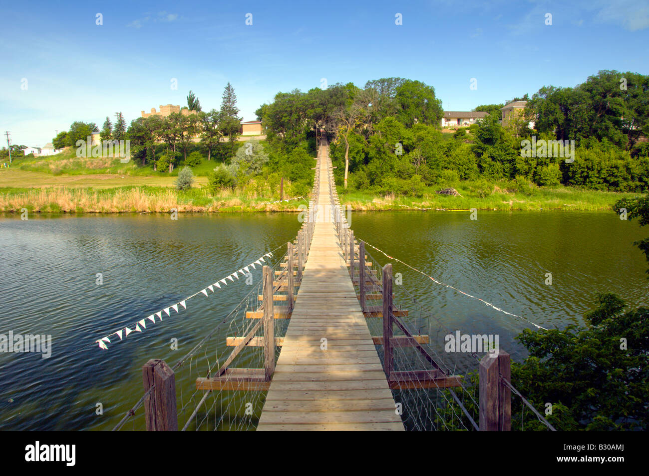 The famous swinging bridge across the Souris river in Souris Manitoba ...
