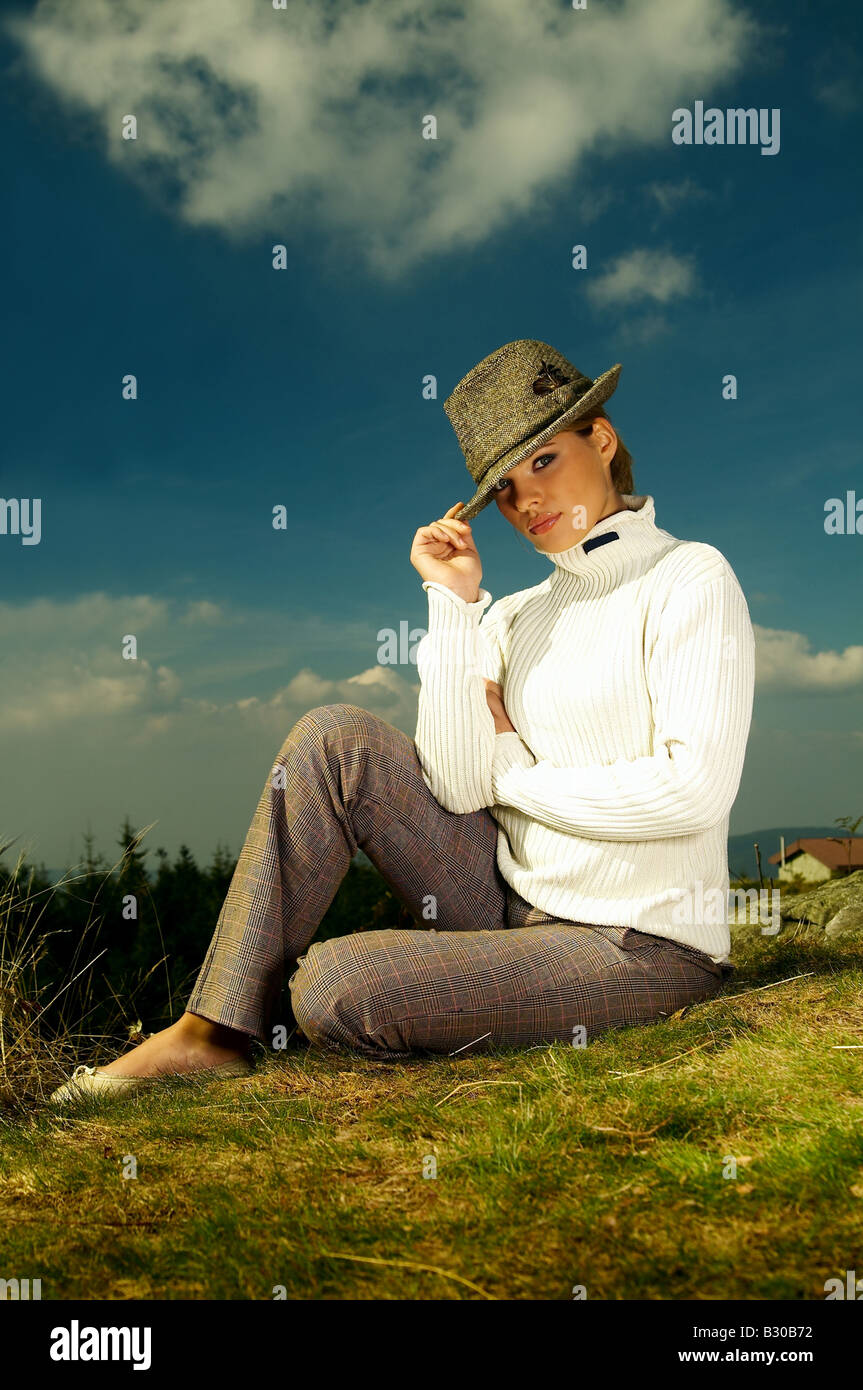 Young beautiful model posing in mountain outdoor scenery Stock Photo ...