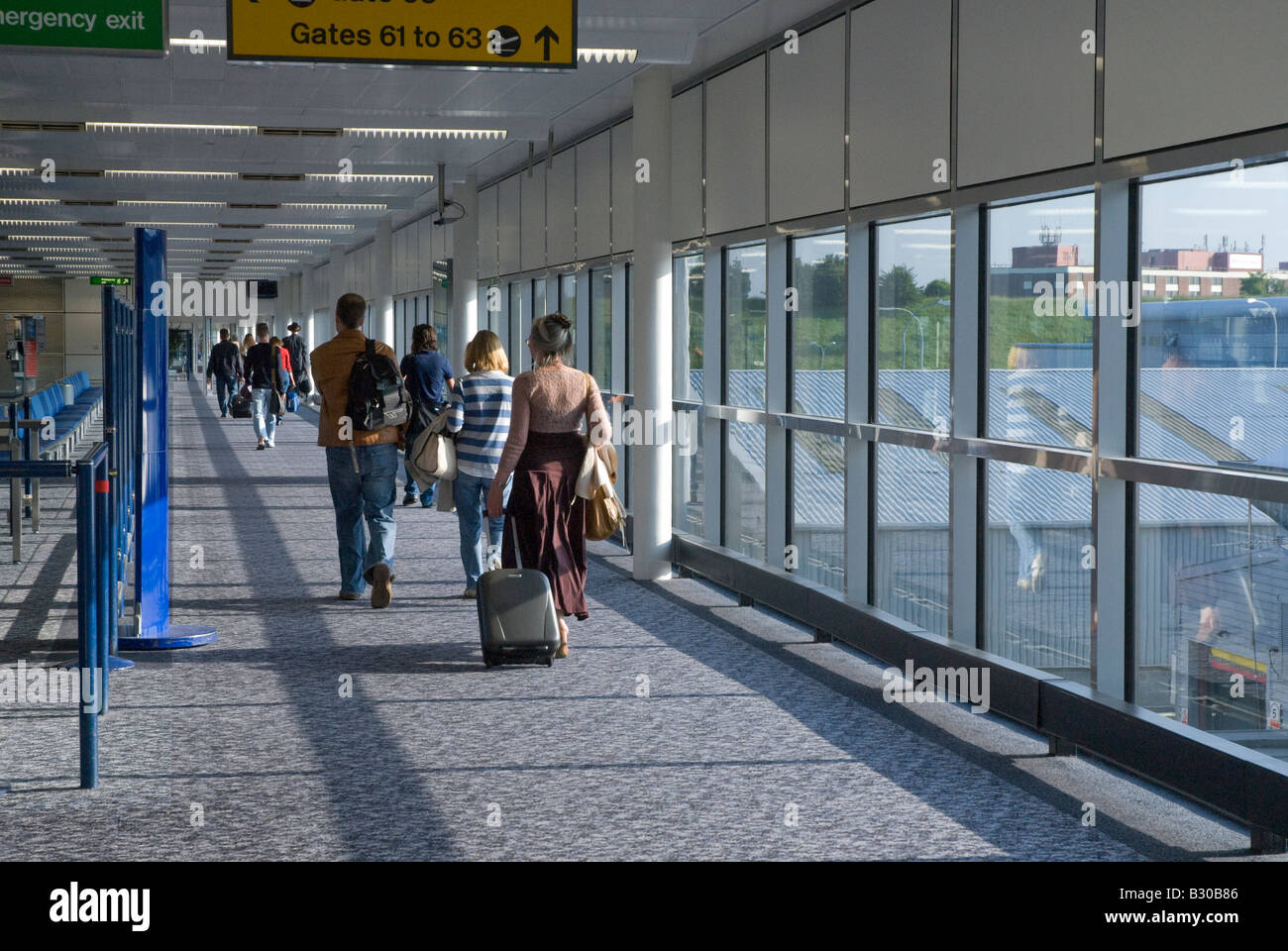Travelling to departure gate 63 at Gatwick airport north terminal Stock Photo - Alamy