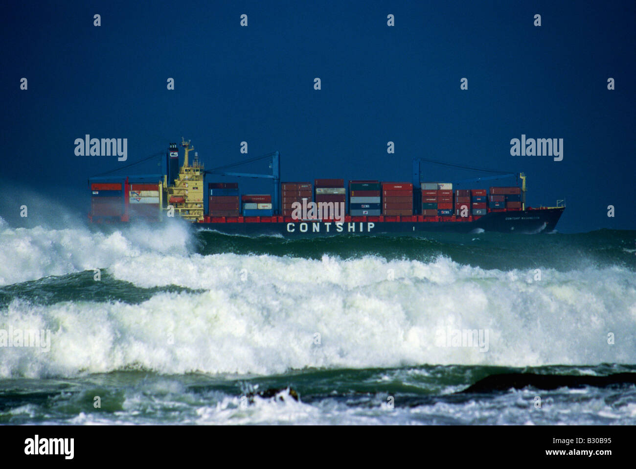 Container Ship traveling through heavy seas Stock Photo - Alamy