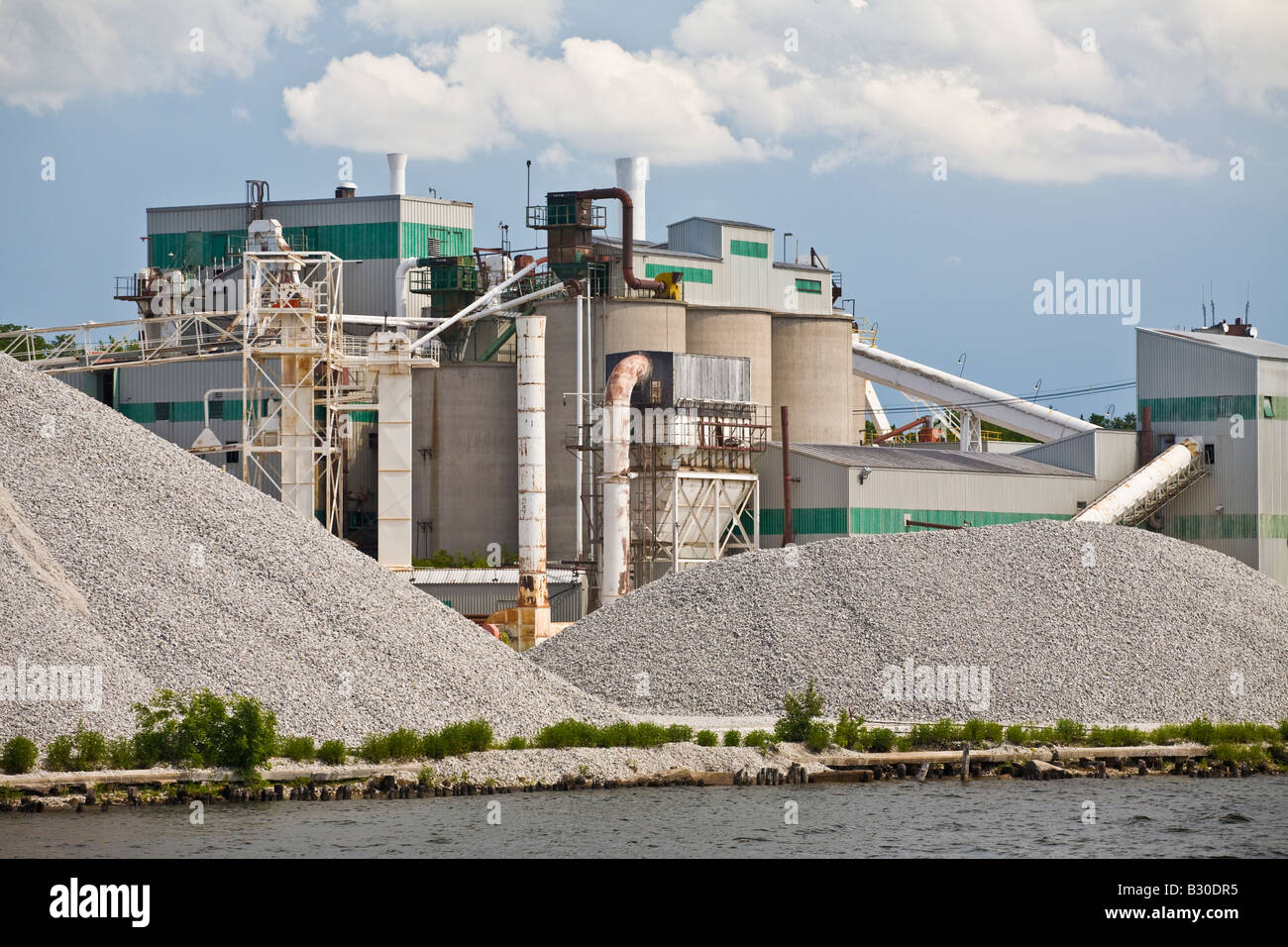 Silica aggregate works in Midland, Ontario, Canada. Standing beside the ...