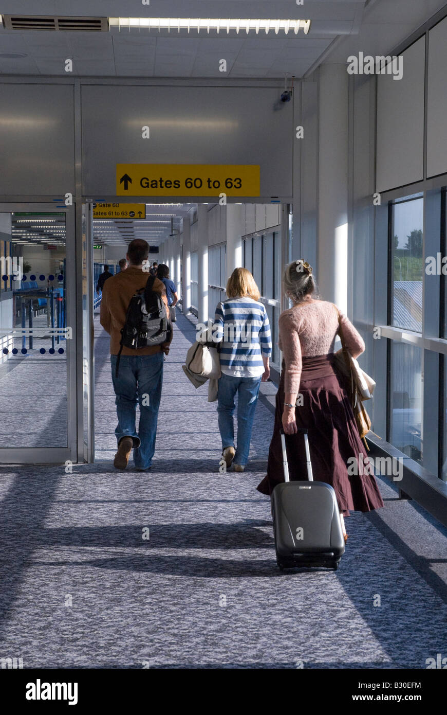 Travelling to departure gate 63 at Gatwick airport north terminal Stock ...