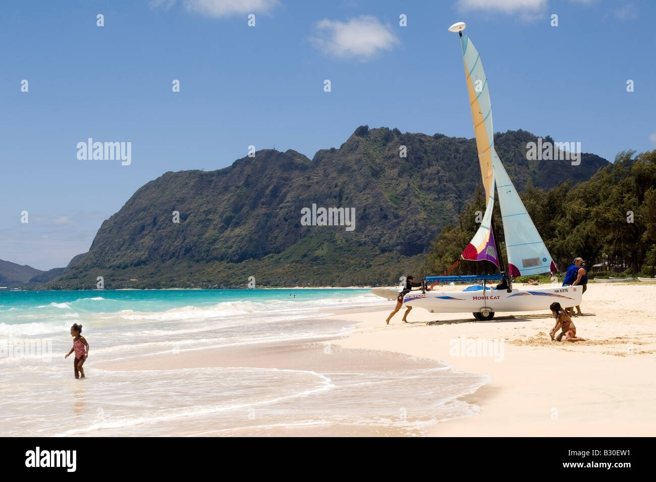 Beach activities in tropical paradise Stock Photo - Alamy