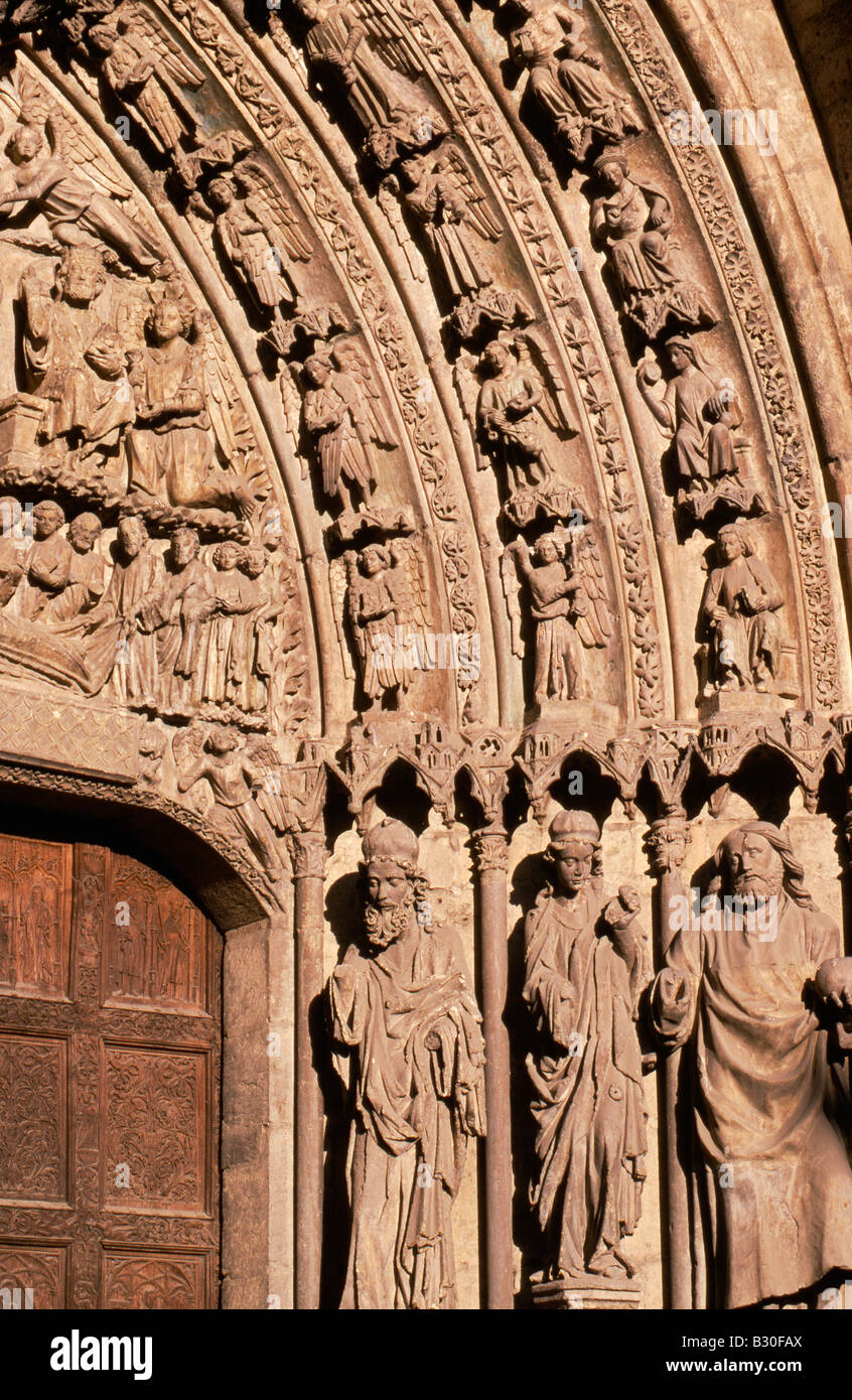 Carved detail on one of the triple doorways on the gothic west facade ...