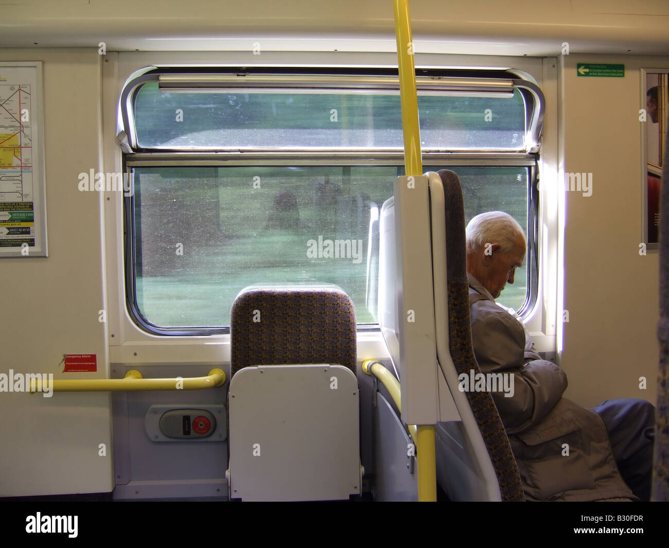 old man sleeping inside train carriage Stock Photo - Alamy