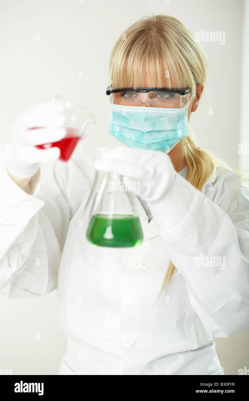 Female lab worker testing and experimenting Stock Photo - Alamy