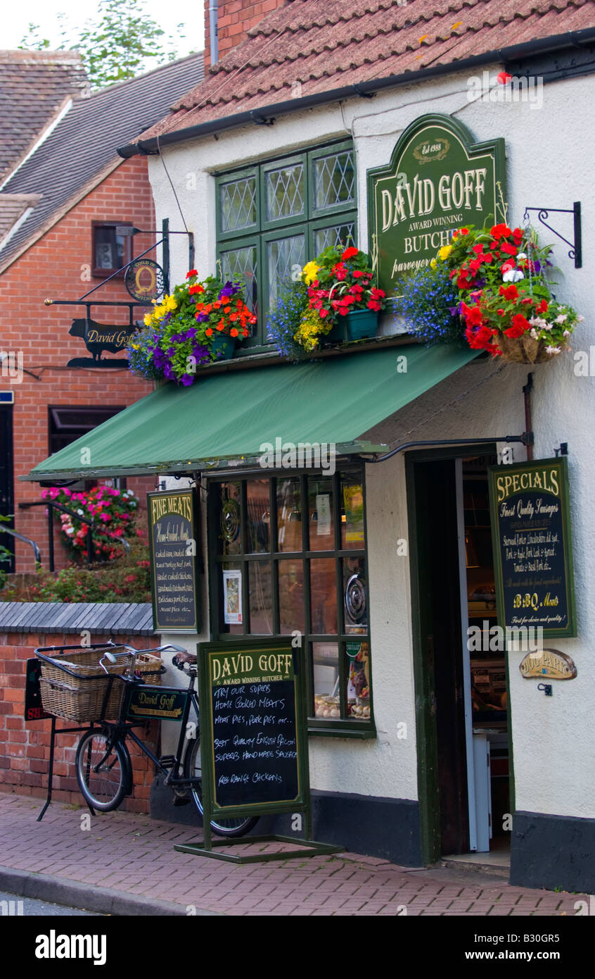 DAVID GOFF butchers shop with traditional bike outside in village of ...