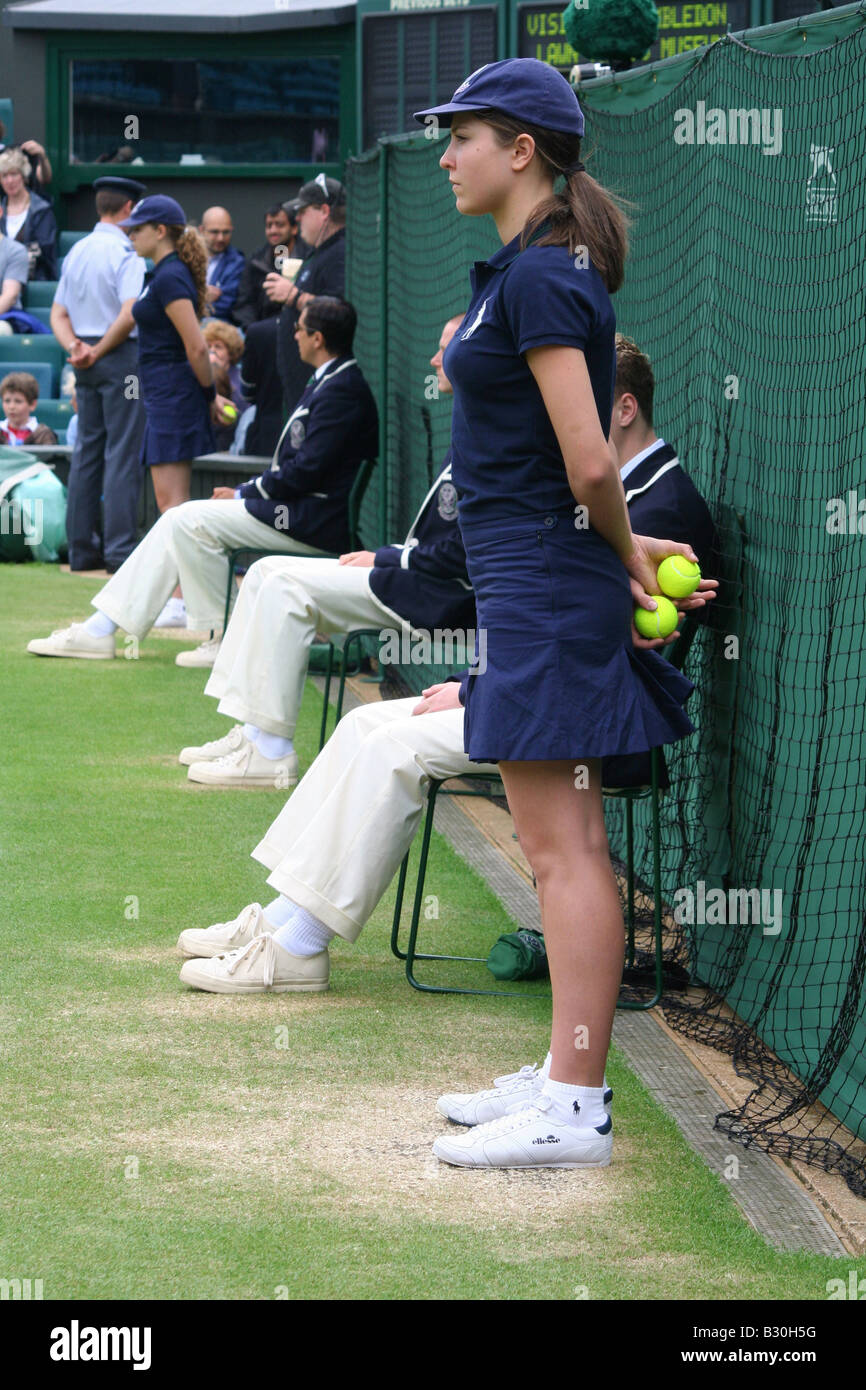 Ball girl and line umpires on centre court at the Wimbledon Tennis ... Ball girl and line umpires on centre court at the Wimbledon Tennis ...